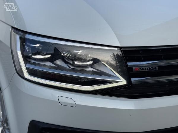 White Volkswagen Multivan 2016 in Tallinn, with an engine capacity of 2.00 L and mileage of 190 thousand km for 29999 €, photo 5 on AUTOMOTO.COM.LV