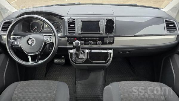 White Volkswagen Multivan 2018 in Riga, with an engine capacity of 2.00 L and mileage of 216 thousand km for 27000 €, photo 5 on AUTOMOTO.COM.LV