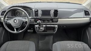 White Volkswagen Multivan 2018 in Riga, with an engine capacity of 2.00 L and mileage of 216 thousand km for 27000 €, photo 6 on AUTOMOTO.COM.LV