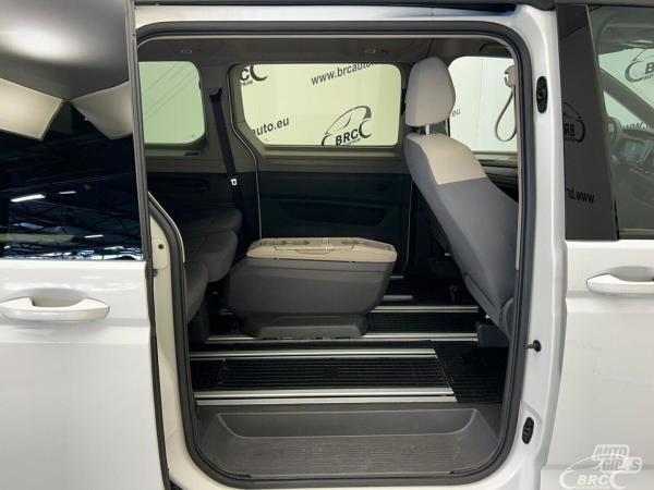 White Volkswagen Multivan 2023 in Avizieniai, with an engine capacity of 2.00 L and mileage of 150 thousand km for 36900 €, photo 9 on AUTOMOTO.COM.LV