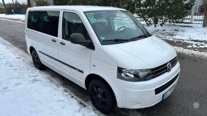 White Volkswagen Multivan 2011 in Vilnius, with an engine capacity of 1.97 L and mileage of 275 thousand km for 12190 €, photo 4 on AUTOMOTO.COM.LV