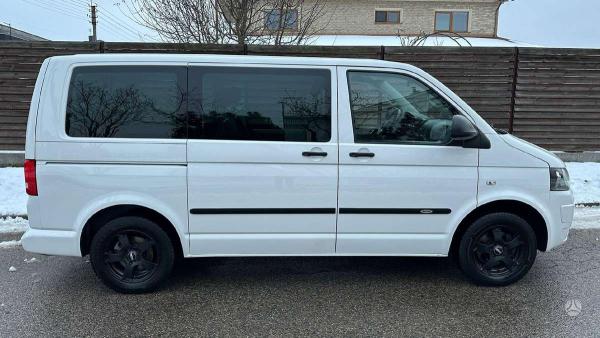 White Volkswagen Multivan 2011 in Vilnius, with an engine capacity of 1.97 L and mileage of 275 thousand km for 11970 €, photo 5 on AUTOMOTO.COM.LV