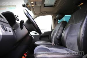 White Volkswagen Multivan 2011 in Riga, with an engine capacity of 2.00 L and mileage of 286 thousand km for 10995 €, photo 13 on AUTOMOTO.COM.LV