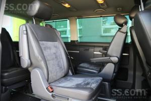 White Volkswagen Multivan 2011 in Riga, with an engine capacity of 2.00 L and mileage of 286 thousand km for 10995 €, photo 15 on AUTOMOTO.COM.LV