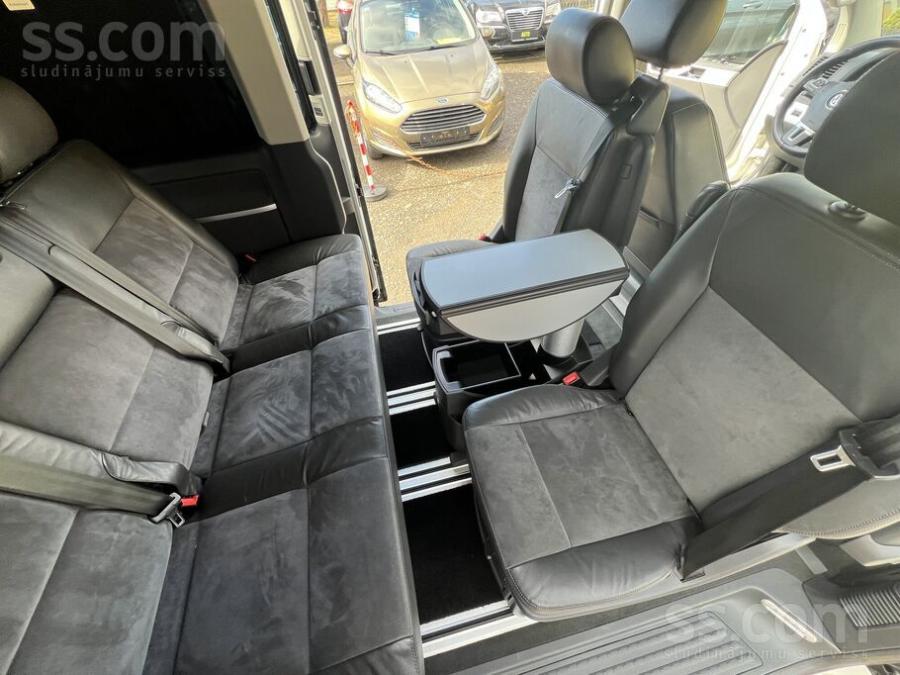 White Volkswagen Multivan 2011 in Liepaja, with an engine capacity of 2.00 L and mileage of 265 thousand km for 18250 €, photo 12 on AUTOMOTO.COM.LV