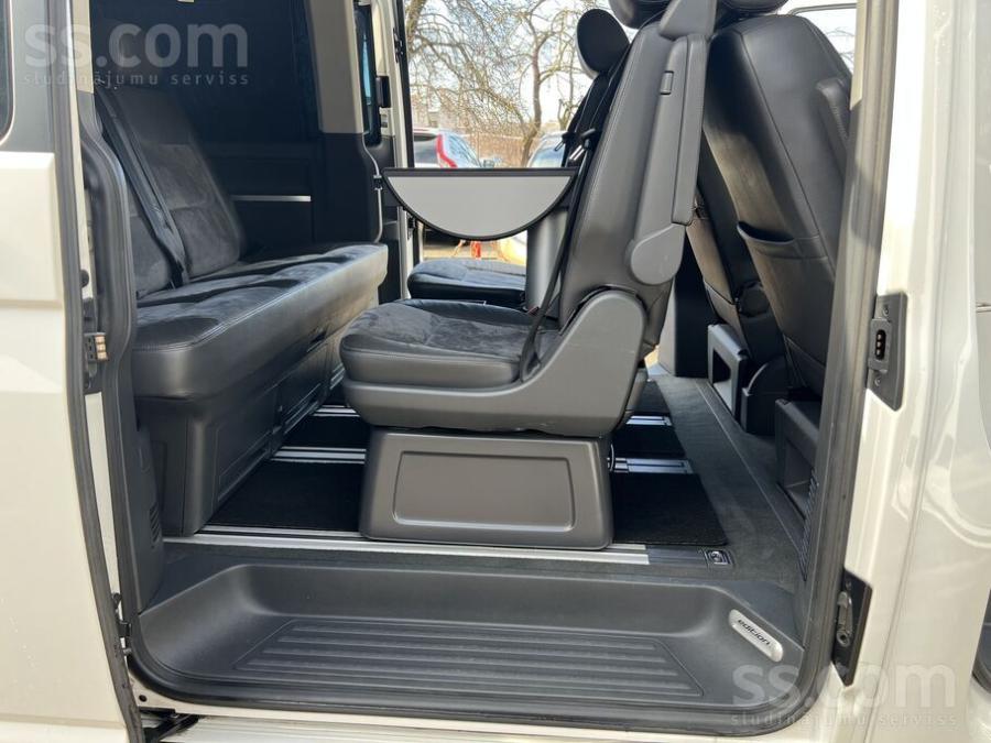 White Volkswagen Multivan 2011 in Liepaja, with an engine capacity of 2.00 L and mileage of 265 thousand km for 18250 €, photo 15 on AUTOMOTO.COM.LV