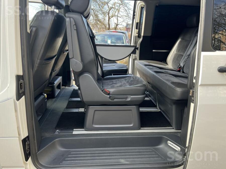 White Volkswagen Multivan 2011 in Liepaja, with an engine capacity of 2.00 L and mileage of 265 thousand km for 18250 €, photo 17 on AUTOMOTO.COM.LV