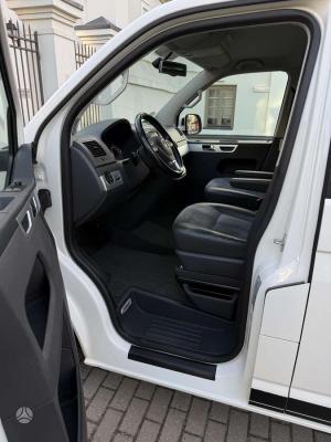 White Volkswagen Multivan 2012 in Vilnius, with an engine capacity of 1.97 L and mileage of 142 thousand km for 18200 €, photo 14 on AUTOMOTO.COM.LV