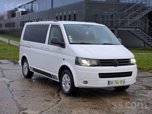 White Volkswagen Multivan 2013 in Riga, with an engine capacity of 2.00 L and mileage of 231 thousand km for 17450 €, photo 4 on AUTOMOTO.COM.LV