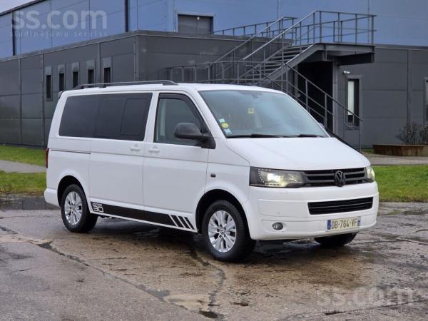White Volkswagen Multivan 2013 in Riga, with an engine capacity of 2.00 L and mileage of 231 thousand km for 17450 €, photo 5 on AUTOMOTO.COM.LV