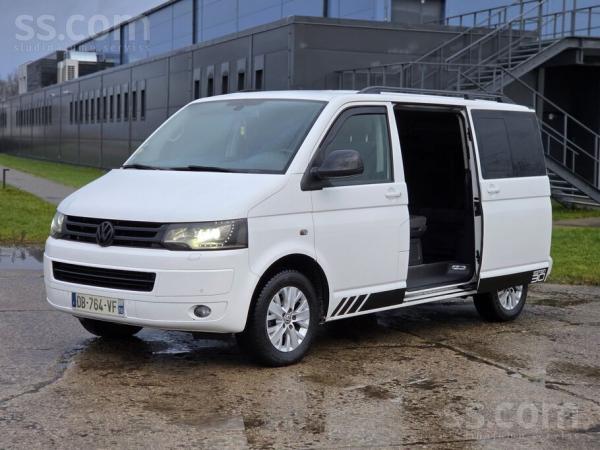 White Volkswagen Multivan 2013 in Riga, with an engine capacity of 2.00 L and mileage of 231 thousand km for 17450 €, photo 7 on AUTOMOTO.COM.LV