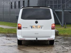 White Volkswagen Multivan 2013 in Riga, with an engine capacity of 2.00 L and mileage of 231 thousand km for 17450 €, photo 12 on AUTOMOTO.COM.LV