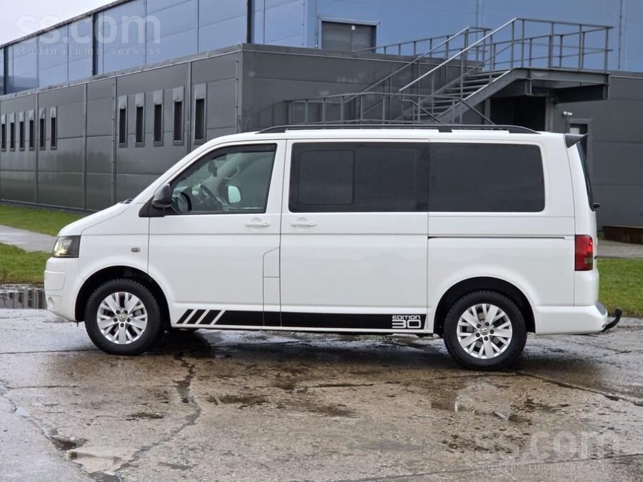 White Volkswagen Multivan 2013 in Riga, with an engine capacity of 2.00 L and mileage of 231 thousand km for 17450 €, photo 14 on AUTOMOTO.COM.LV