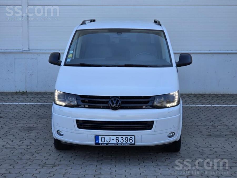 White Volkswagen Multivan 2013 in Riga, with an engine capacity of 2.00 L and mileage of 231 thousand km for 16990 €, photo 5 on AUTOMOTO.COM.LV