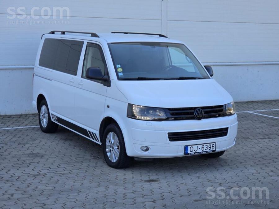 White Volkswagen Multivan 2013 in Riga, with an engine capacity of 2.00 L and mileage of 231 thousand km for 16990 €, photo 7 on AUTOMOTO.COM.LV