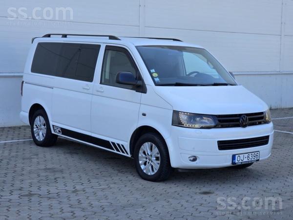 White Volkswagen Multivan 2013 in Riga, with an engine capacity of 2.00 L and mileage of 231 thousand km for 16990 €, photo 7 on AUTOMOTO.COM.LV