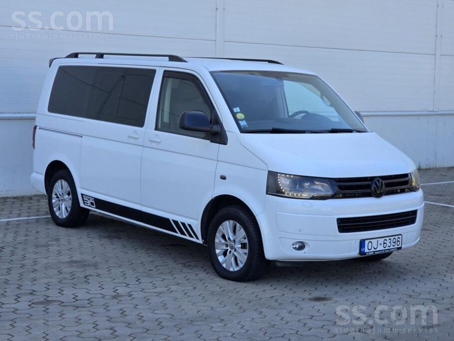 White Volkswagen Multivan 2013 in Riga, with an engine capacity of 2.00 L and mileage of 231 thousand km for 16990 €, photo 8 on AUTOMOTO.COM.LV