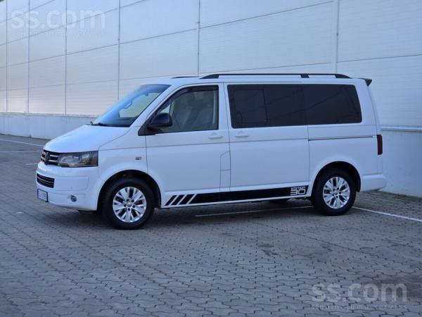 White Volkswagen Multivan 2013 in Riga, with an engine capacity of 2.00 L and mileage of 231 thousand km for 16990 €, photo 9 on AUTOMOTO.COM.LV