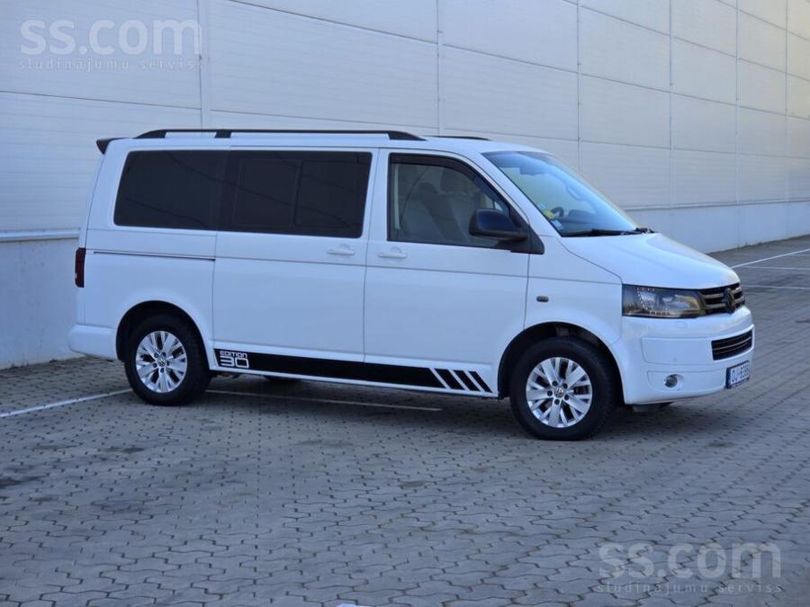 White Volkswagen Multivan 2013 in Riga, with an engine capacity of 2.00 L and mileage of 231 thousand km for 16990 €, photo 11 on AUTOMOTO.COM.LV