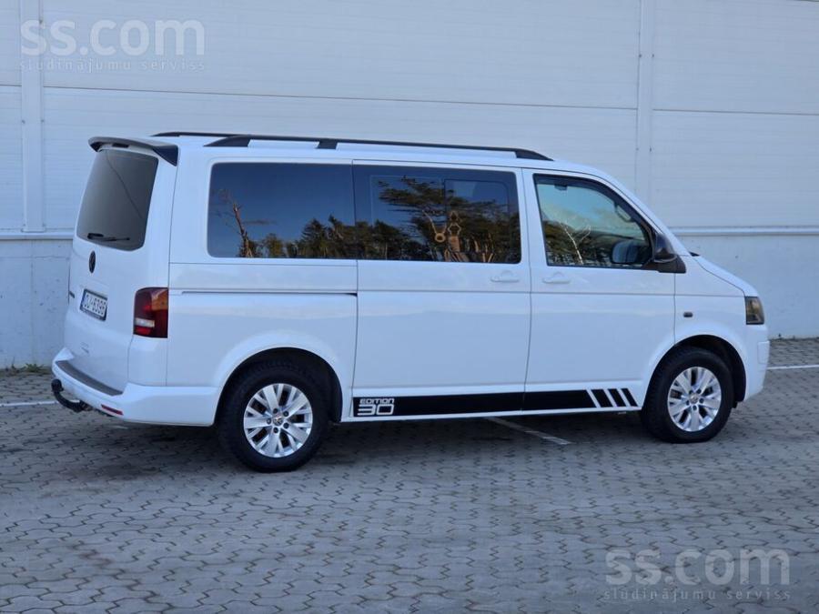 White Volkswagen Multivan 2013 in Riga, with an engine capacity of 2.00 L and mileage of 231 thousand km for 16990 €, photo 15 on AUTOMOTO.COM.LV