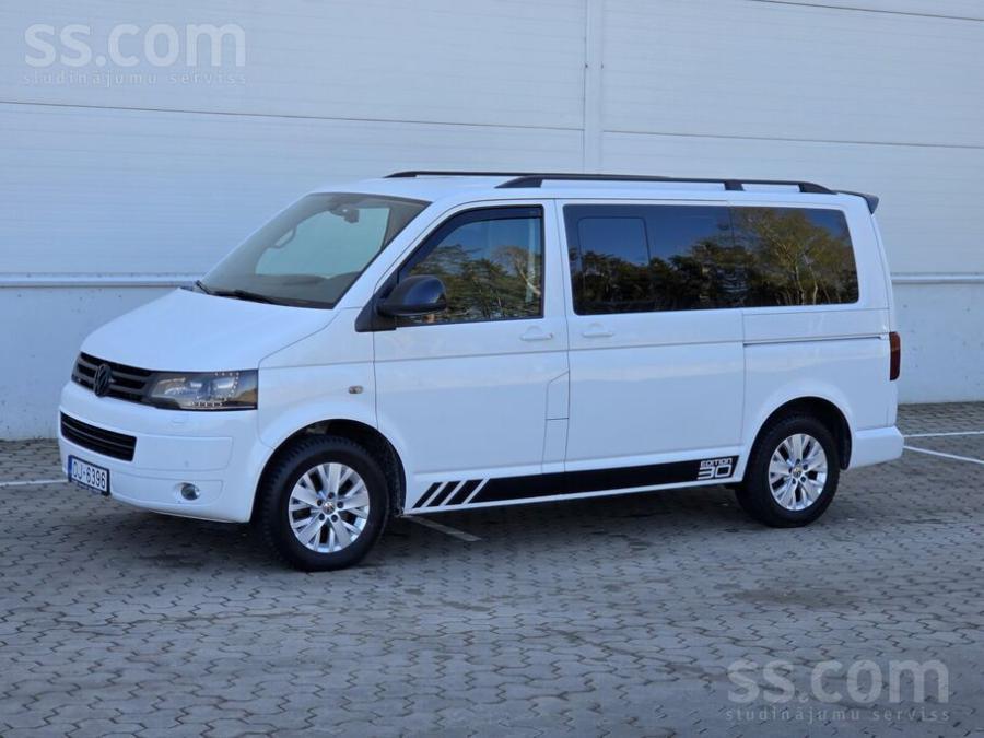 White Volkswagen Multivan 2013 in Riga, with an engine capacity of 2.00 L and mileage of 231 thousand km for 16990 €, photo 18 on AUTOMOTO.COM.LV