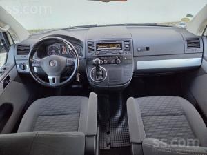 White Volkswagen Multivan 2013 in Riga, with an engine capacity of 2.00 L and mileage of 231 thousand km for 16990 €, photo 21 on AUTOMOTO.COM.LV