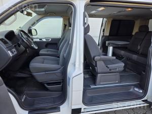 White Volkswagen Multivan 2013 in Riga, with an engine capacity of 2.00 L and mileage of 231 thousand km for 16990 €, photo 28 on AUTOMOTO.COM.LV