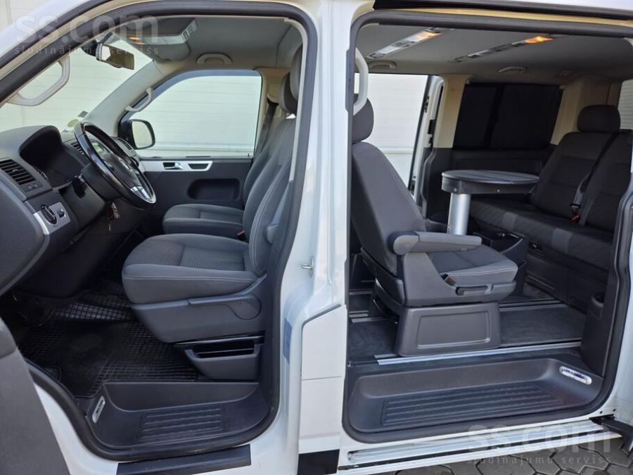 White Volkswagen Multivan 2013 in Riga, with an engine capacity of 2.00 L and mileage of 231 thousand km for 16990 €, photo 28 on AUTOMOTO.COM.LV