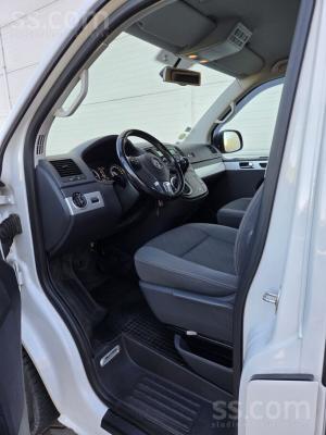 White Volkswagen Multivan 2013 in Riga, with an engine capacity of 2.00 L and mileage of 231 thousand km for 16990 €, photo 29 on AUTOMOTO.COM.LV