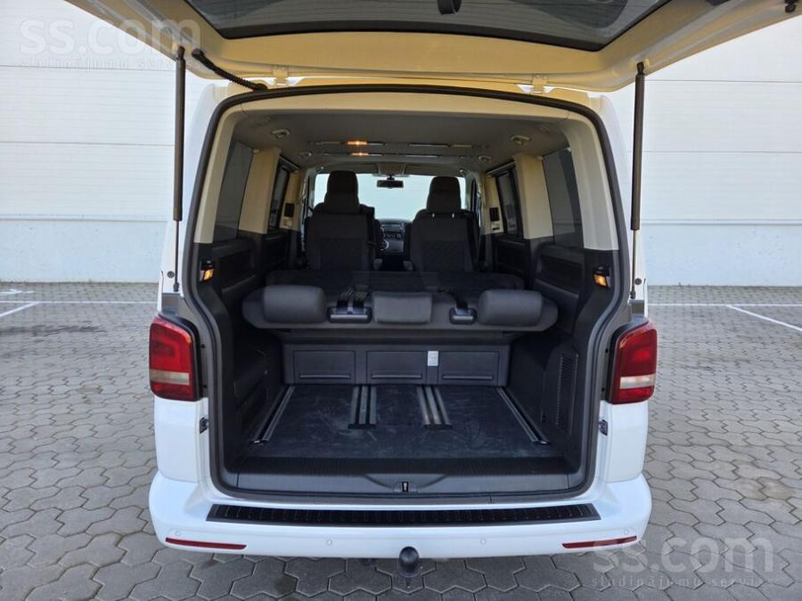 White Volkswagen Multivan 2013 in Riga, with an engine capacity of 2.00 L and mileage of 231 thousand km for 16990 €, photo 30 on AUTOMOTO.COM.LV
