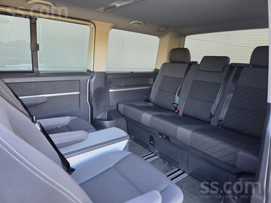 White Volkswagen Multivan 2013 in Riga, with an engine capacity of 2.00 L and mileage of 231 thousand km for 16990 €, photo 31 on AUTOMOTO.COM.LV
