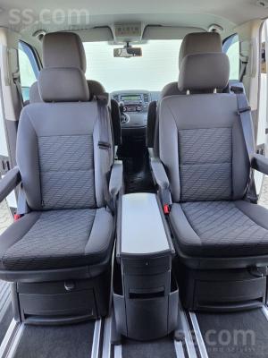 White Volkswagen Multivan 2013 in Riga, with an engine capacity of 2.00 L and mileage of 231 thousand km for 16990 €, photo 34 on AUTOMOTO.COM.LV