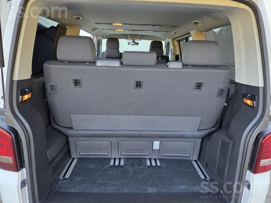 White Volkswagen Multivan 2013 in Riga, with an engine capacity of 2.00 L and mileage of 231 thousand km for 16990 €, photo 35 on AUTOMOTO.COM.LV