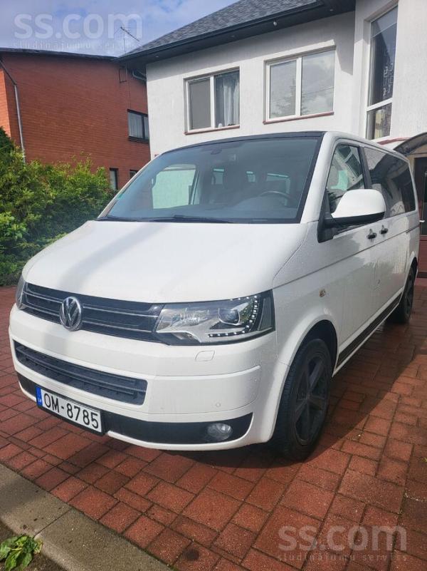 White Volkswagen Multivan 2014 in Riga, with an engine capacity of 2.00 L and mileage of 189 thousand km for 19900 €, photo 3 on AUTOMOTO.COM.LV