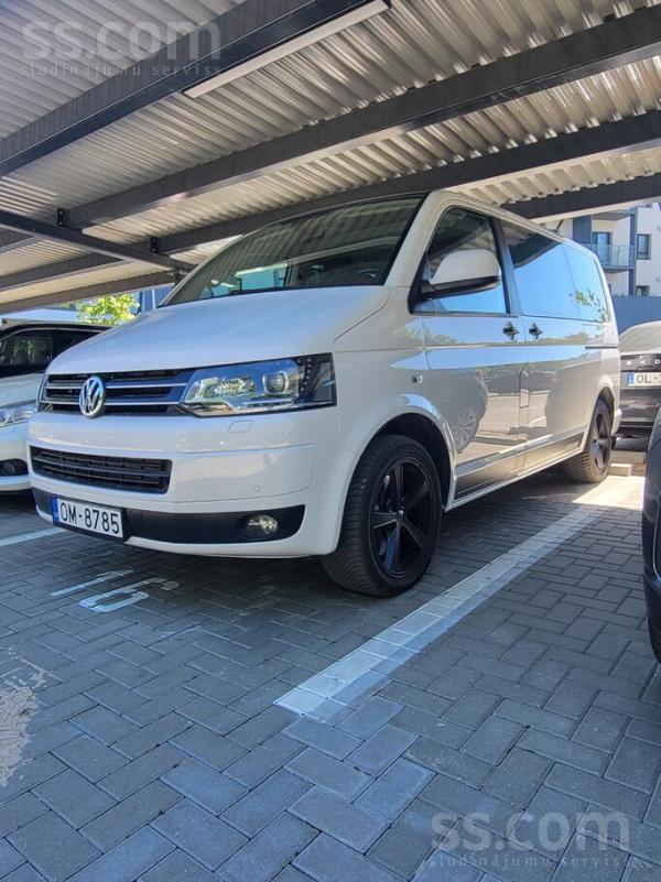 White Volkswagen Multivan 2014 in Riga, with an engine capacity of 2.00 L and mileage of 189 thousand km for 19900 €, photo 10 on AUTOMOTO.COM.LV