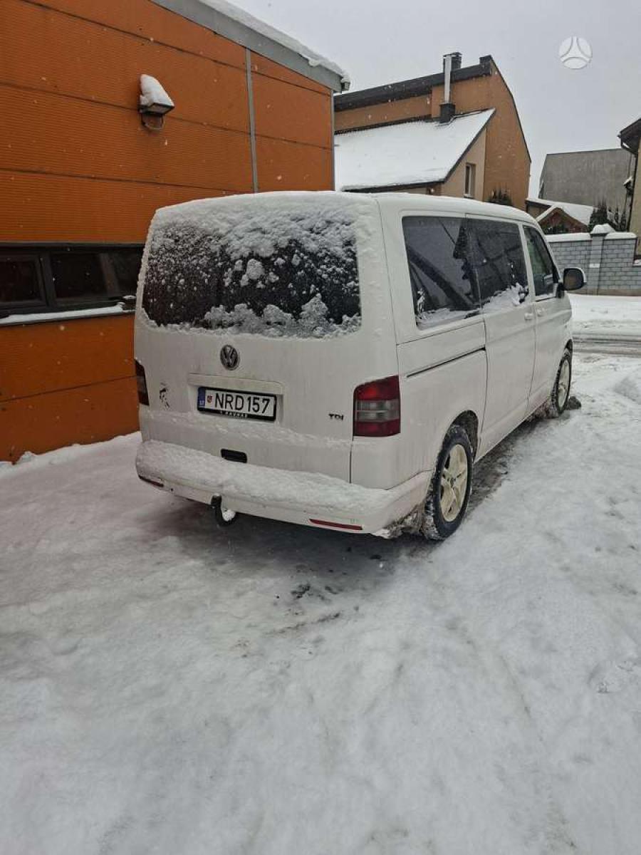 White Volkswagen Multivan 2015 in Kaunas, with an engine capacity of 1.97 L and mileage of 260 thousand km for 9900 €, photo 2 on AUTOMOTO.COM.LV
