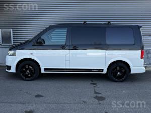 White Volkswagen Multivan 2015 in Riga, with an engine capacity of 2.00 L and mileage of 210 thousand km for 19500 €, photo 3 on AUTOMOTO.COM.LV