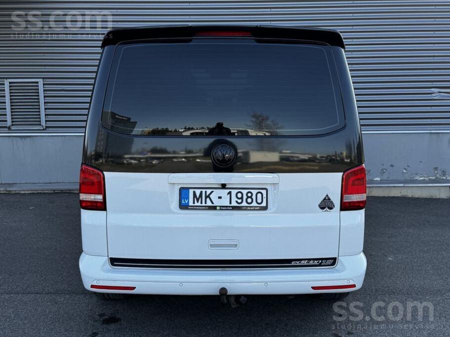 White Volkswagen Multivan 2015 in Riga, with an engine capacity of 2.00 L and mileage of 210 thousand km for 19500 €, photo 5 on AUTOMOTO.COM.LV