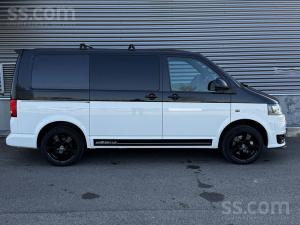 White Volkswagen Multivan 2015 in Riga, with an engine capacity of 2.00 L and mileage of 210 thousand km for 19500 €, photo 7 on AUTOMOTO.COM.LV