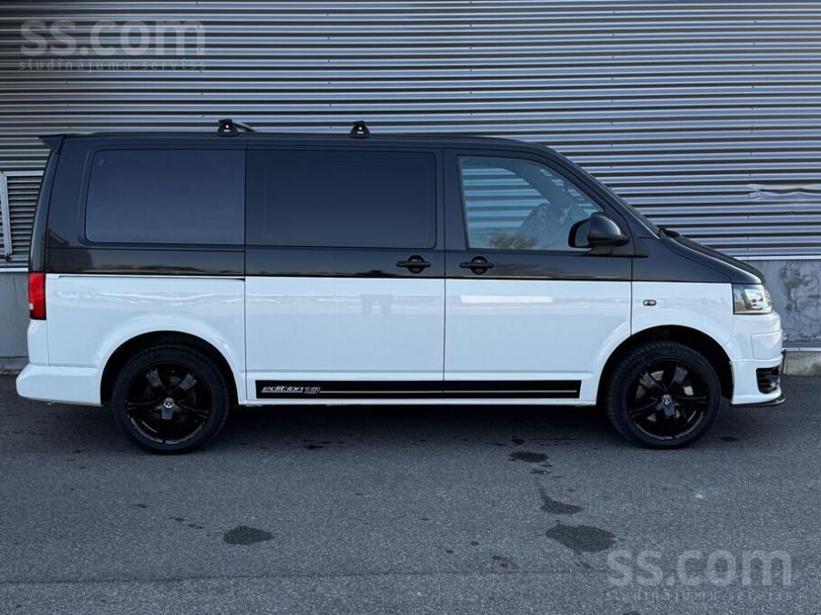 White Volkswagen Multivan 2015 in Riga, with an engine capacity of 2.00 L and mileage of 210 thousand km for 19500 €, photo 7 on AUTOMOTO.COM.LV