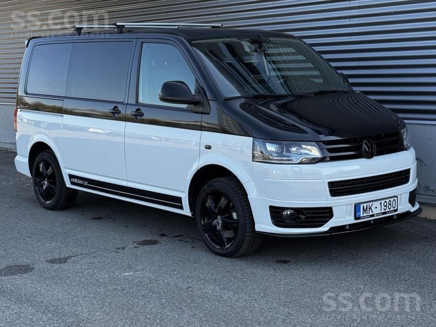 White Volkswagen Multivan 2015 in Riga, with an engine capacity of 2.00 L and mileage of 210 thousand km for 19500 €, photo 8 on AUTOMOTO.COM.LV