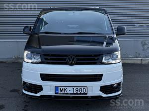 White Volkswagen Multivan 2015 in Riga, with an engine capacity of 2.00 L and mileage of 210 thousand km for 19500 €, photo 9 on AUTOMOTO.COM.LV