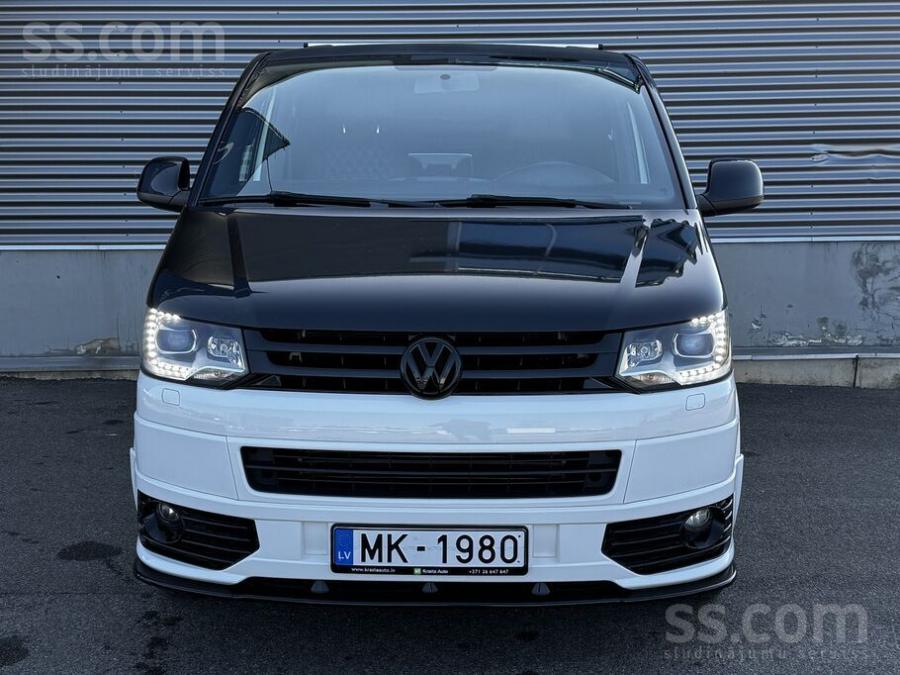 White Volkswagen Multivan 2015 in Riga, with an engine capacity of 2.00 L and mileage of 210 thousand km for 19500 €, photo 9 on AUTOMOTO.COM.LV
