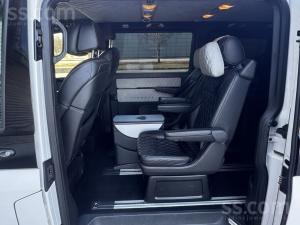 White Volkswagen Multivan 2015 in Riga, with an engine capacity of 2.00 L and mileage of 210 thousand km for 19500 €, photo 13 on AUTOMOTO.COM.LV