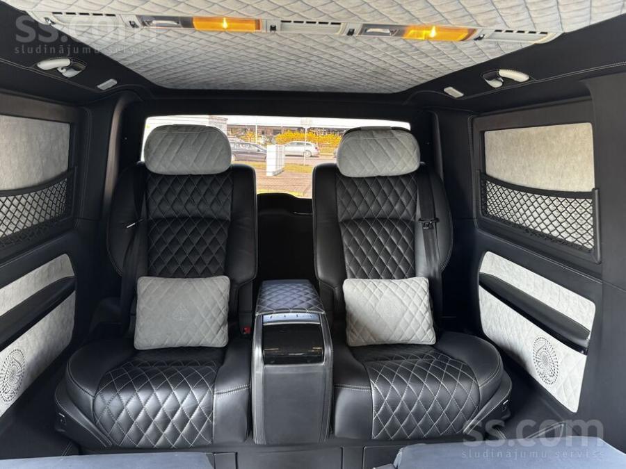 White Volkswagen Multivan 2015 in Riga, with an engine capacity of 2.00 L and mileage of 210 thousand km for 19500 €, photo 15 on AUTOMOTO.COM.LV