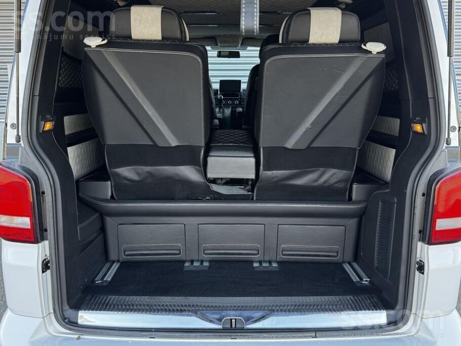 White Volkswagen Multivan 2015 in Riga, with an engine capacity of 2.00 L and mileage of 210 thousand km for 19500 €, photo 20 on AUTOMOTO.COM.LV