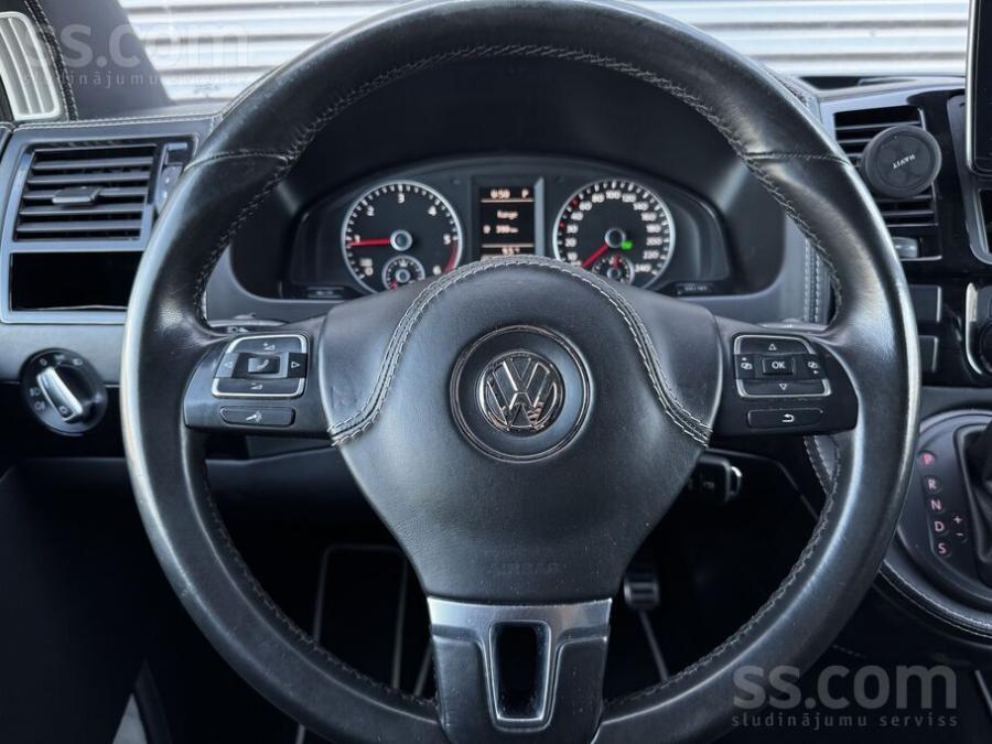 White Volkswagen Multivan 2015 in Riga, with an engine capacity of 2.00 L and mileage of 210 thousand km for 19500 €, photo 21 on AUTOMOTO.COM.LV