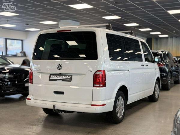 Balts Volkswagen Multivan 2017 Klaipėda, ar dzinēja tilpumu 2.00 L un nobraukumu 297 tūkst. km par 19900 €, foto 3 vietnē AUTOMOTO.COM.LV