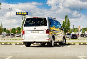 White Volkswagen Multivan 2017 in Riga, with an engine capacity of 2.00 L and mileage of 166 thousand km for 21990 €, photo 7 on AUTOMOTO.COM.LV