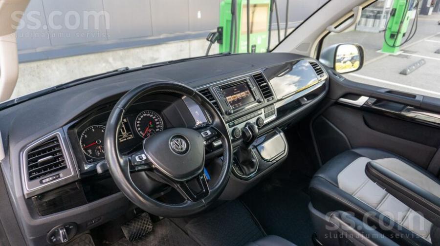 White Volkswagen Multivan 2017 in Riga, with an engine capacity of 2.00 L and mileage of 166 thousand km for 21990 €, photo 11 on AUTOMOTO.COM.LV